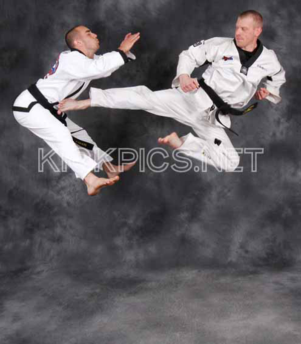 KICKPICS - home of the hottest martial arts kicking photos on the planet.